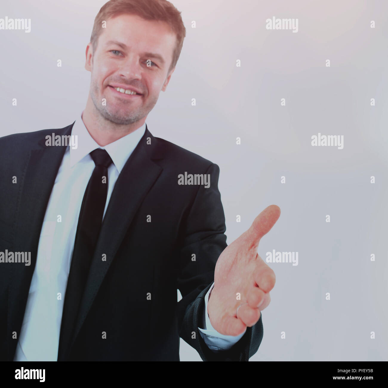 Business man saying welcome and giving hand Stock Photo - Alamy