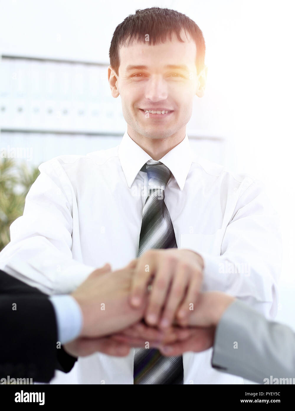 closeup: hands business team stacked together Stock Photo - Alamy