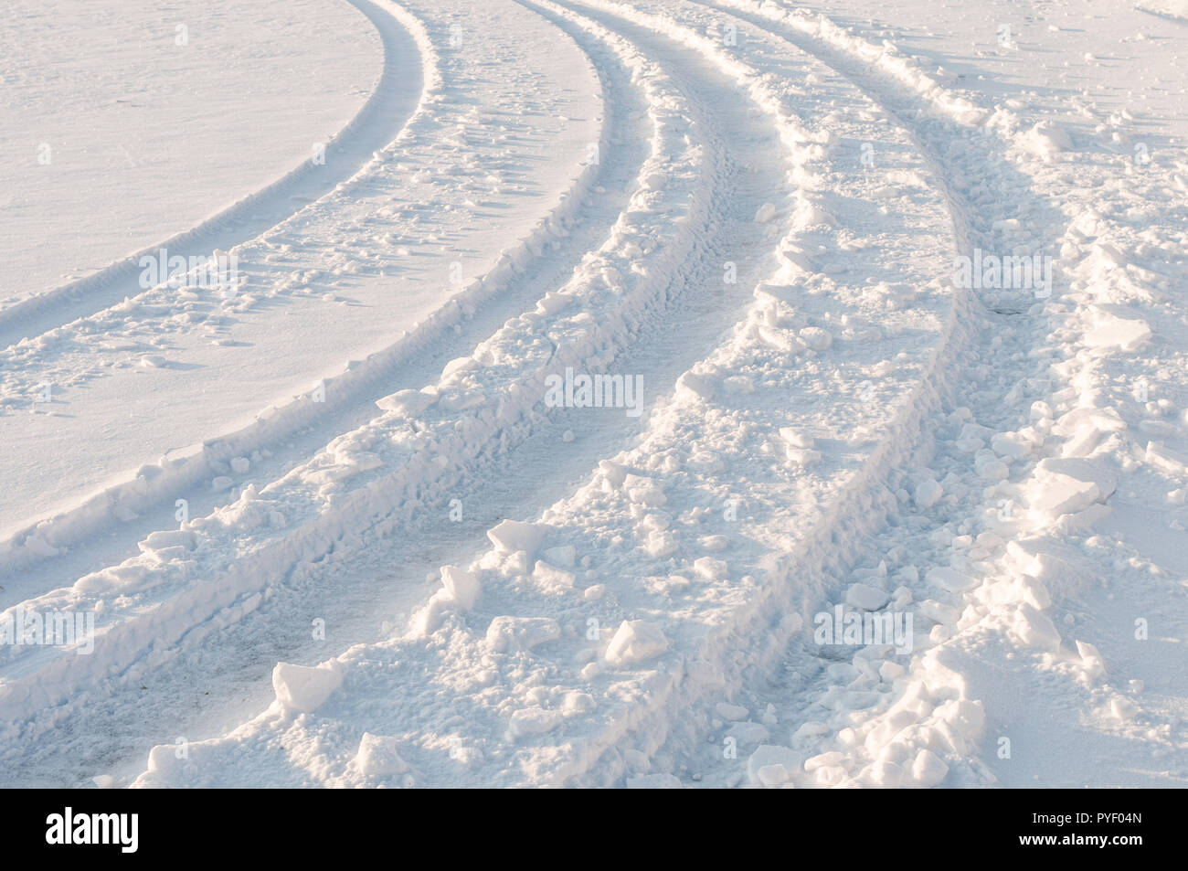 Car tire tracks in fresh snow Stock Photo - Alamy