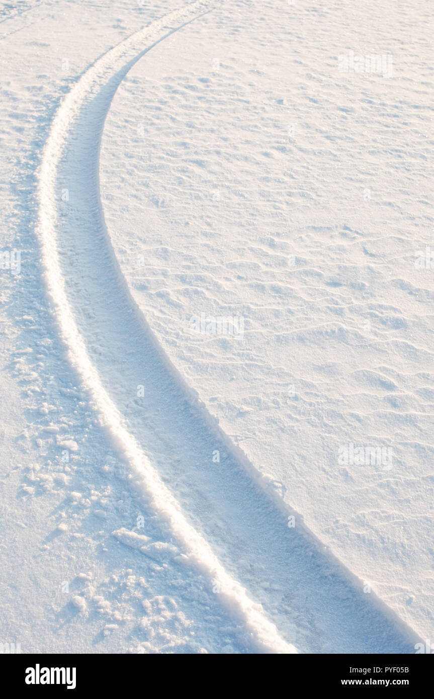 Tire tracks in fresh snow Stock Photo - Alamy