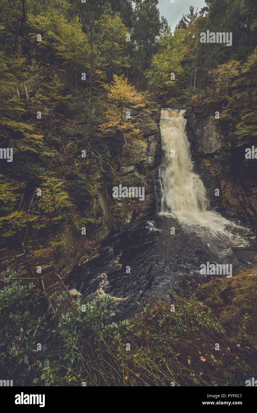 Bushkill Falls in Poconos, PA, surrounded by lush fall foliage Stock ...