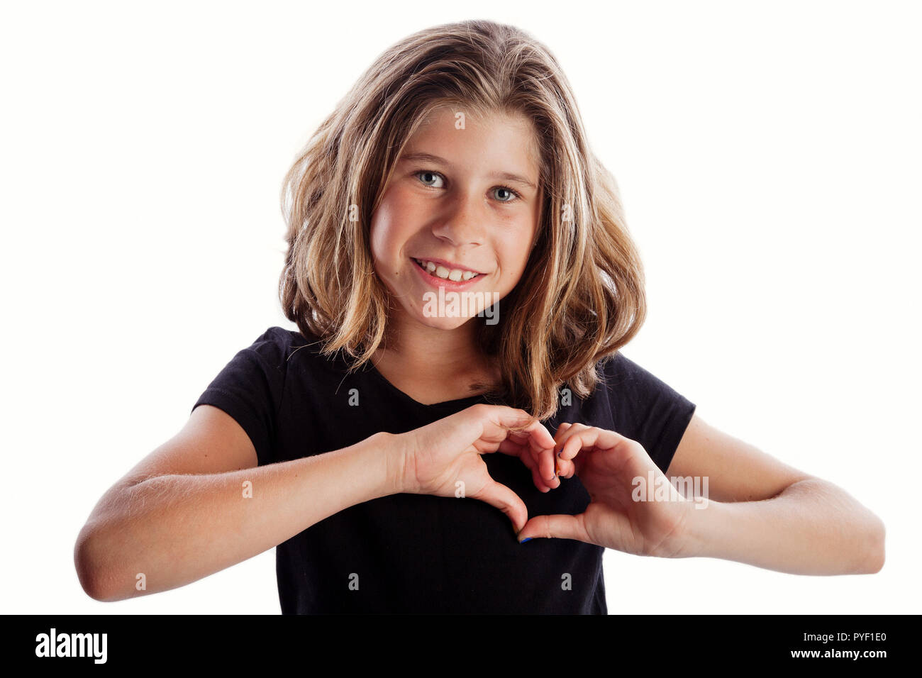 Hands shaped as heart over chest hi-res stock photography and images ...