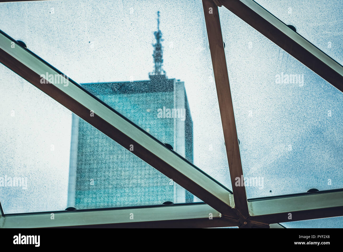 tallest building amid a cloudy sky. a view through a glass roof Stock ...