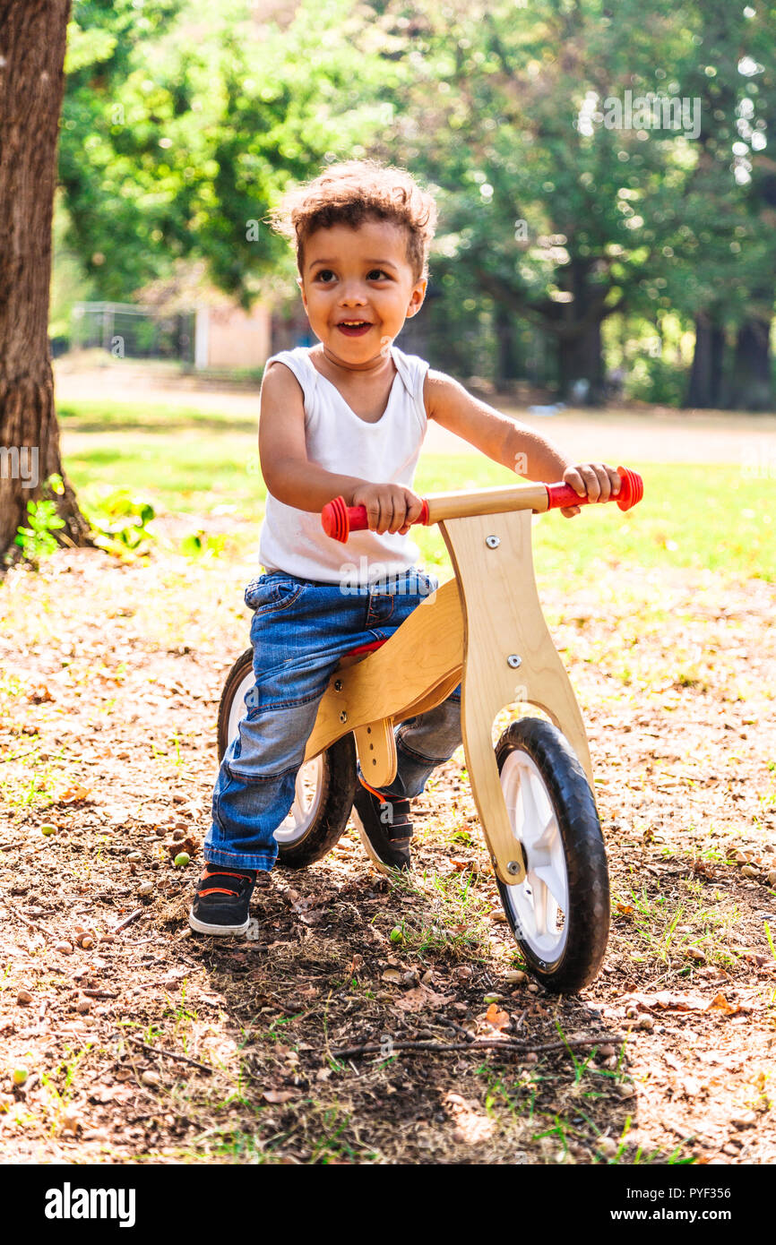 Wooden bicycle african boy hi-res stock photography and images - Alamy