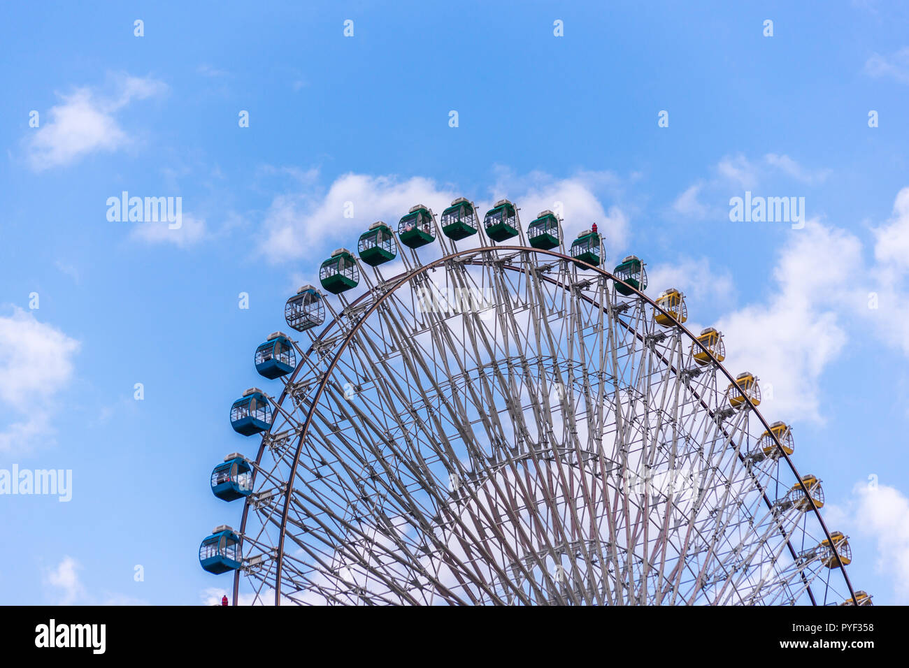 colorful wheel under sunny Stock Photo - Alamy