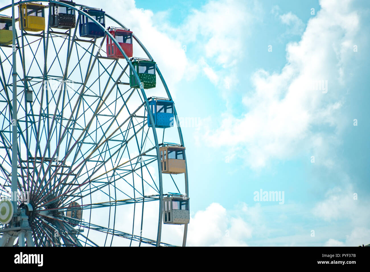 colorful wheel under sunny Stock Photo - Alamy