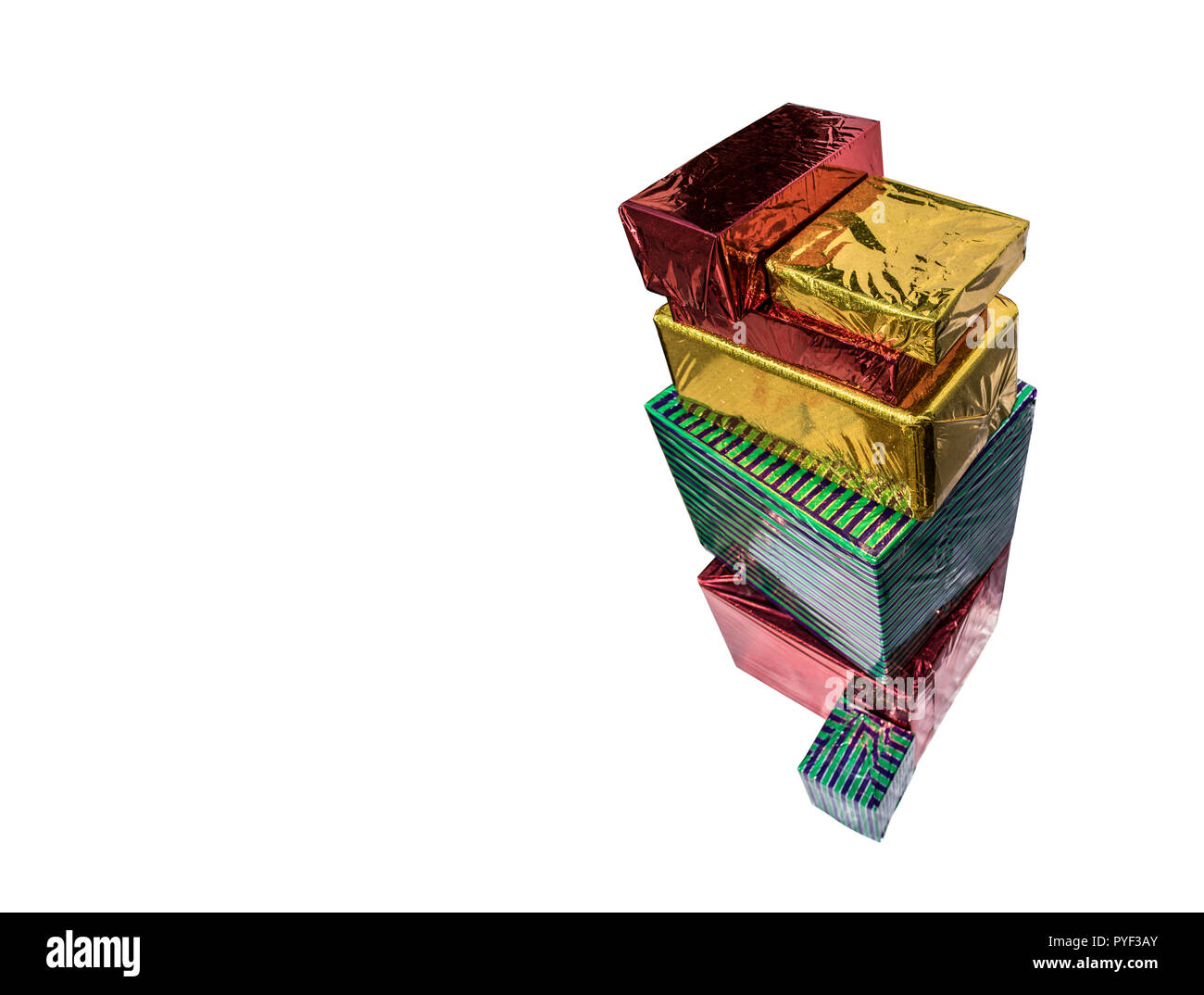 Stack of wrapped gift boxes in green, red and gold on a white ...