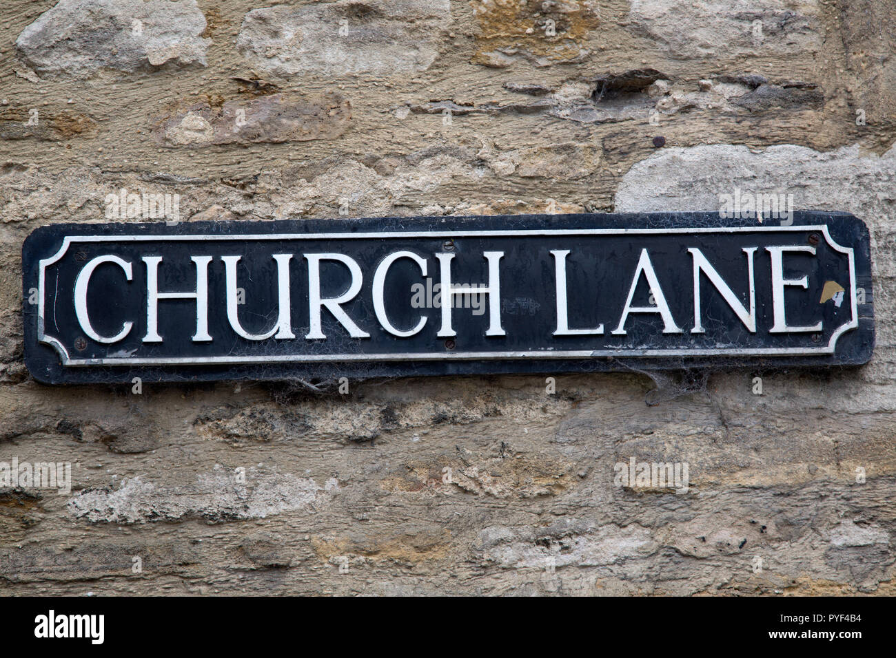 Church Lane Street Sign on Stone Wall Stock Photo - Alamy