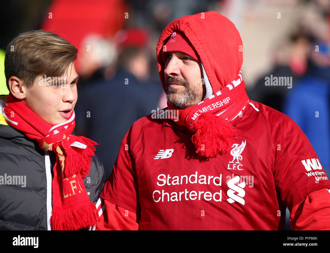 Liverpool fans arrive for the Premier League match at Anfield ...