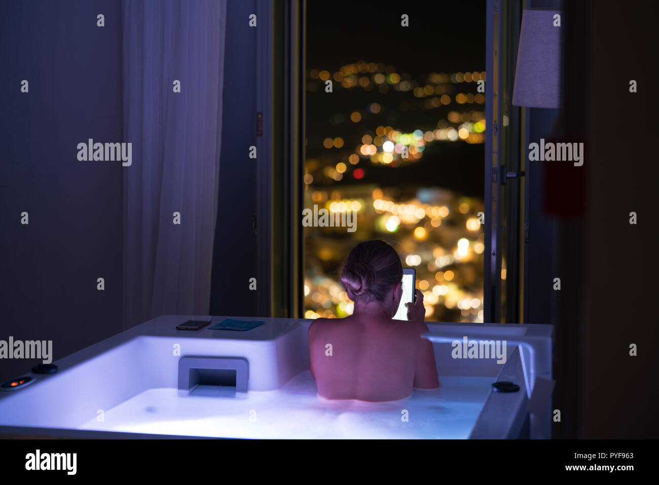 Person reading in pool hi-res stock photography and images - Alamy