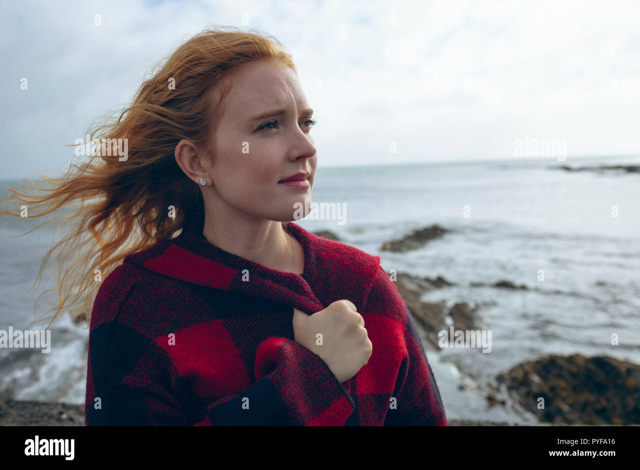 Female redhead beach hi-res stock photography and images - Alamy
