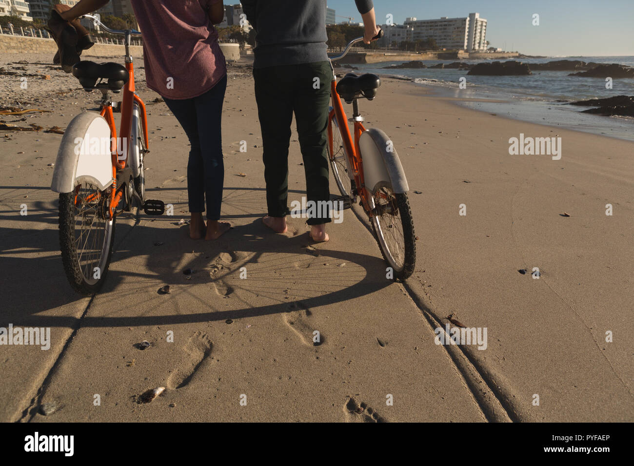 Male female beach walking hi-res stock photography and images - Alamy