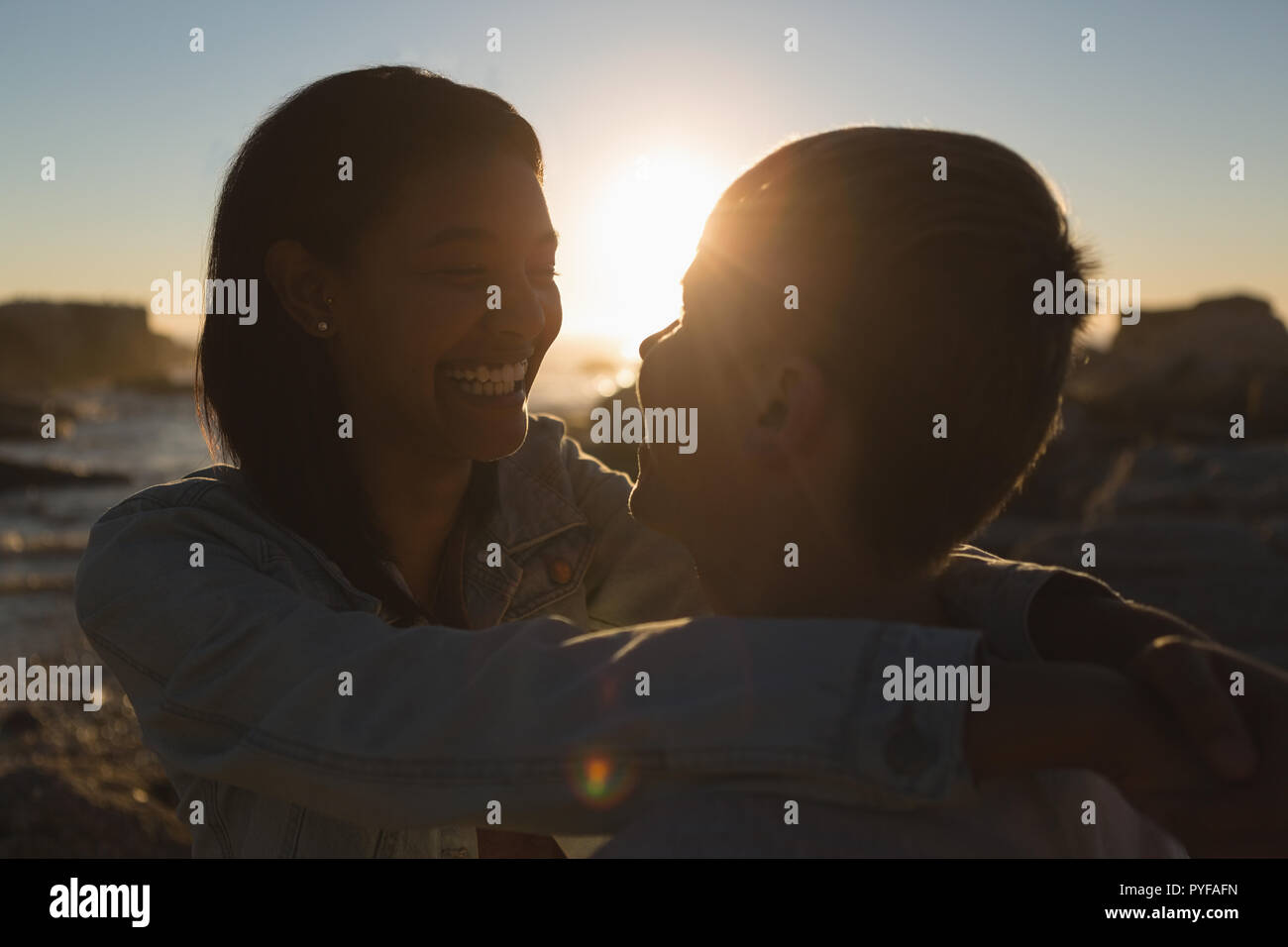 Happy adult caucasian couple having fun on the beach hi-res stock ...