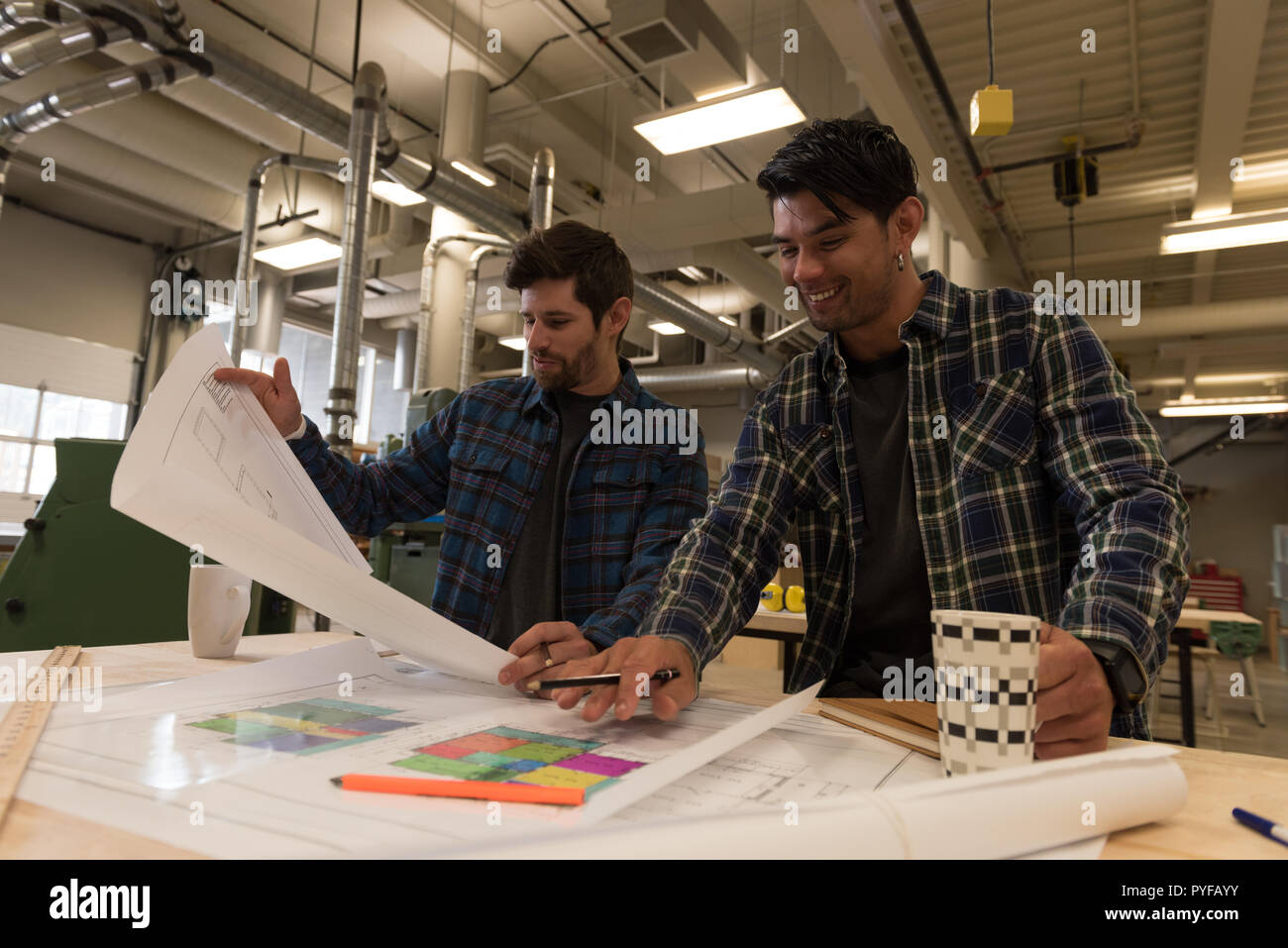 Smiling craftsman sitting in hi-res stock photography and images - Alamy