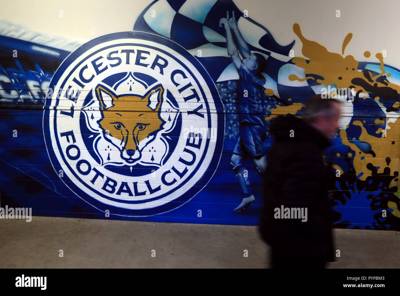 Fans make their way around the concourse at the ground ahead of the ...