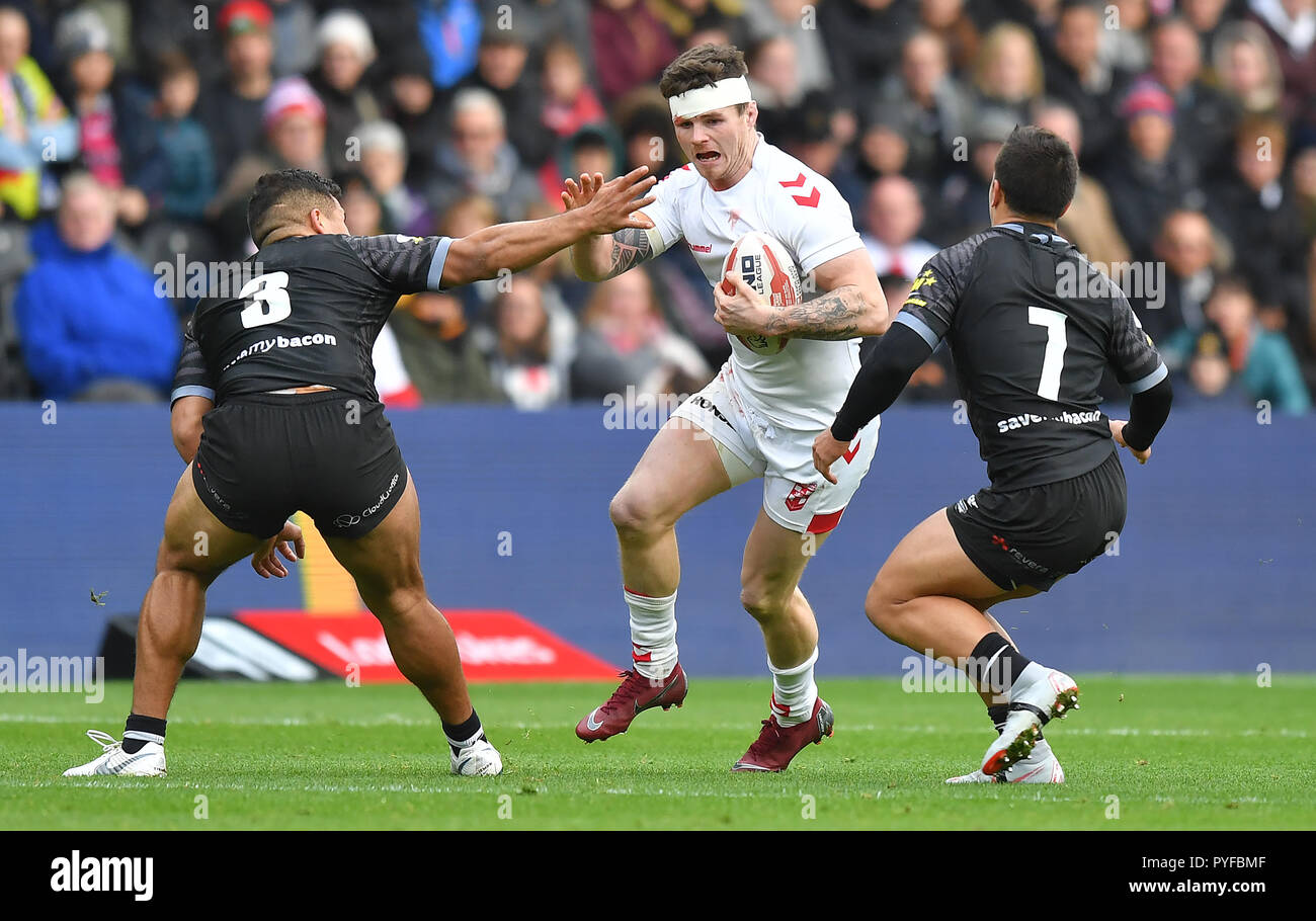 England's John Bateman tries to break through during the International ...