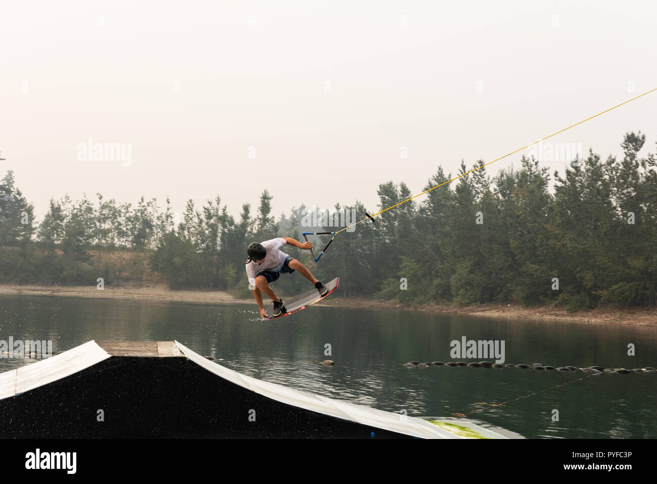Man wakeboarding in the river Stock Photo - Alamy