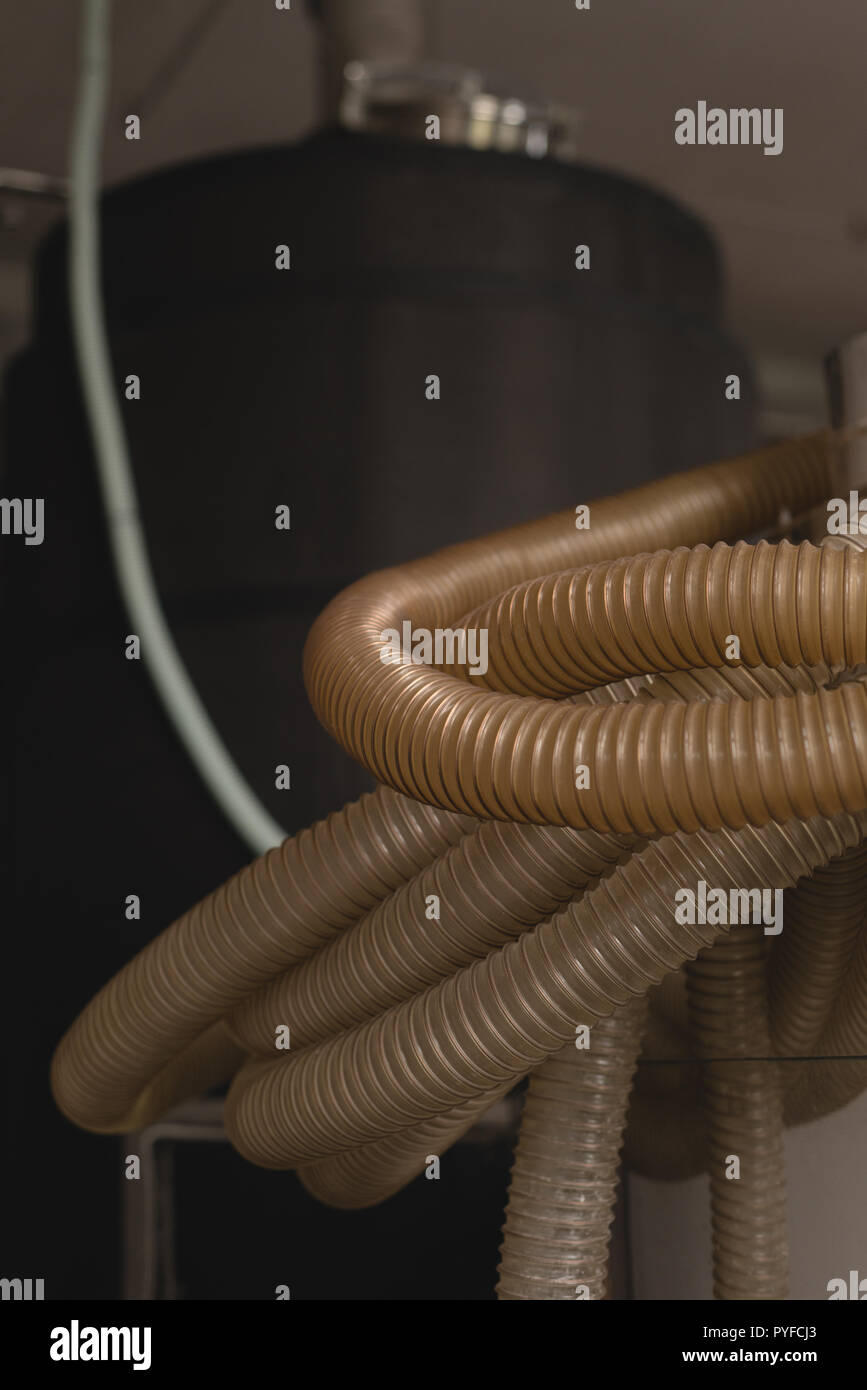 Distillery tank and pipe in factory Stock Photo - Alamy