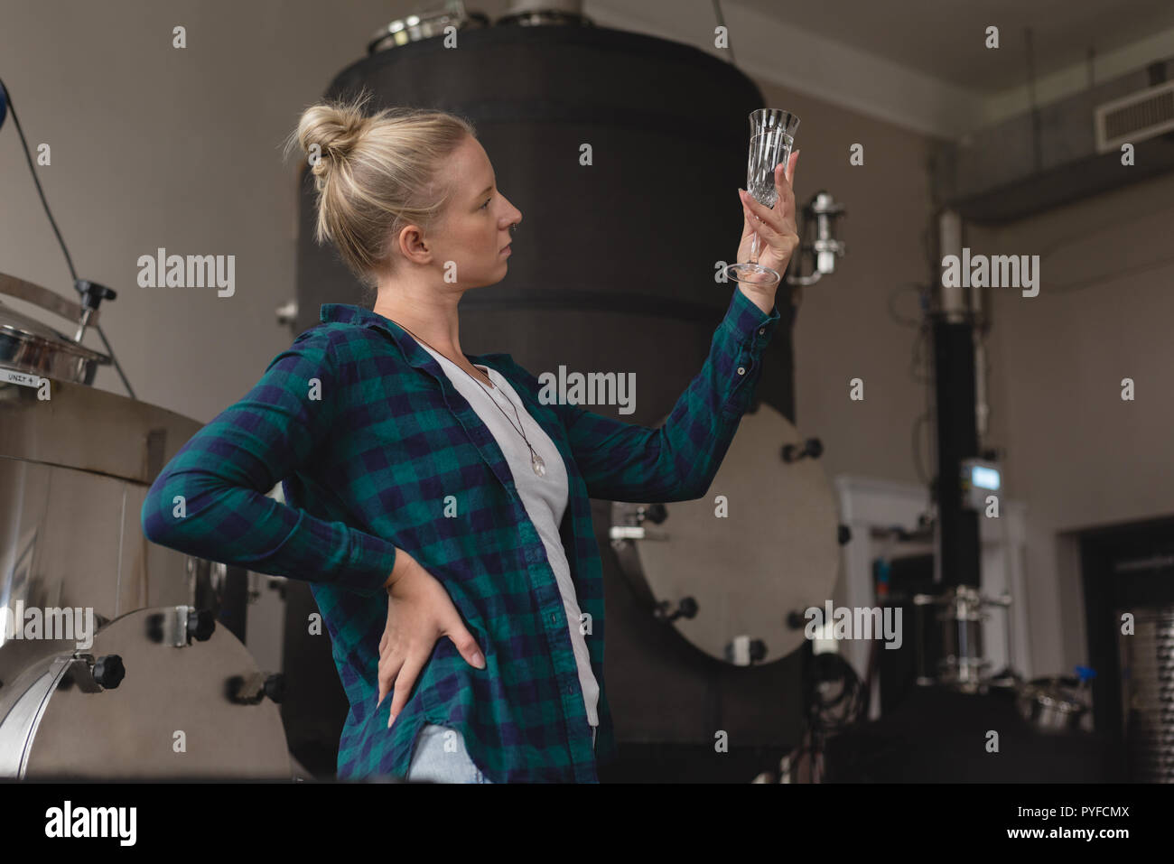 Female worker examining glass hi-res stock photography and images - Alamy