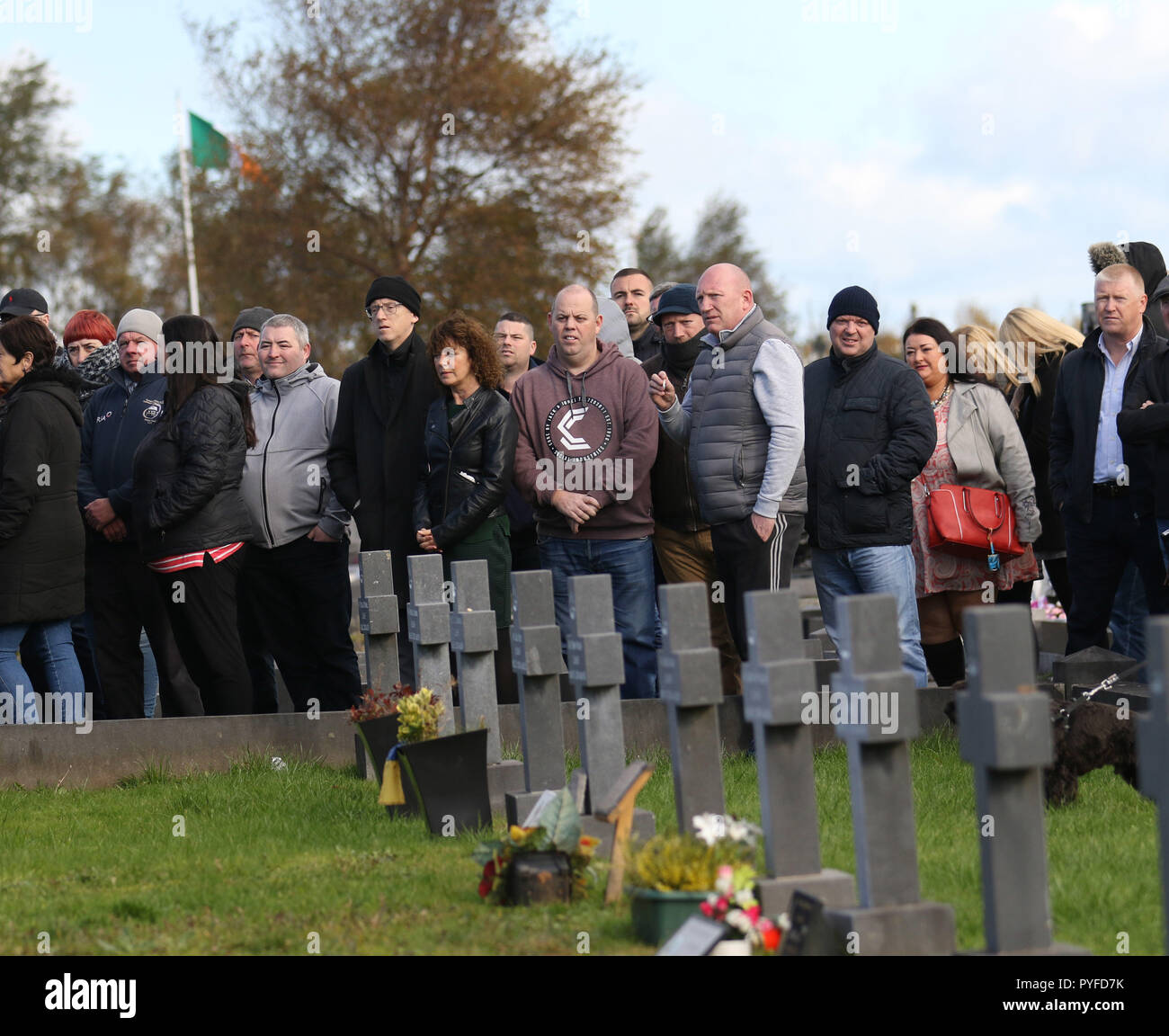 People attend a controversial commemoration at Milltown Cemetery in ...