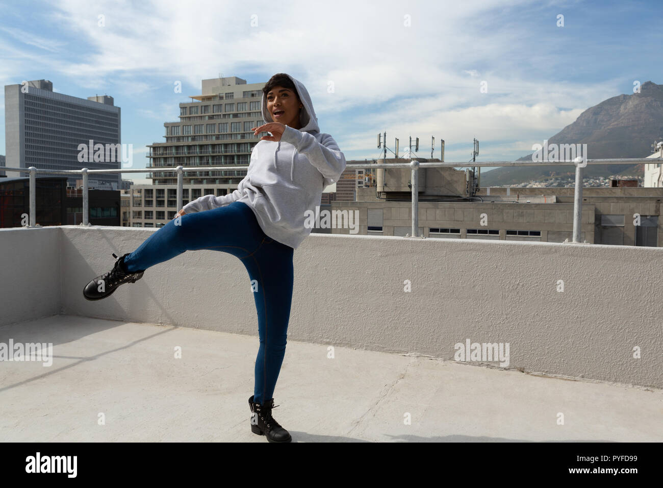 Model dancing on terrace Stock Photo - Alamy