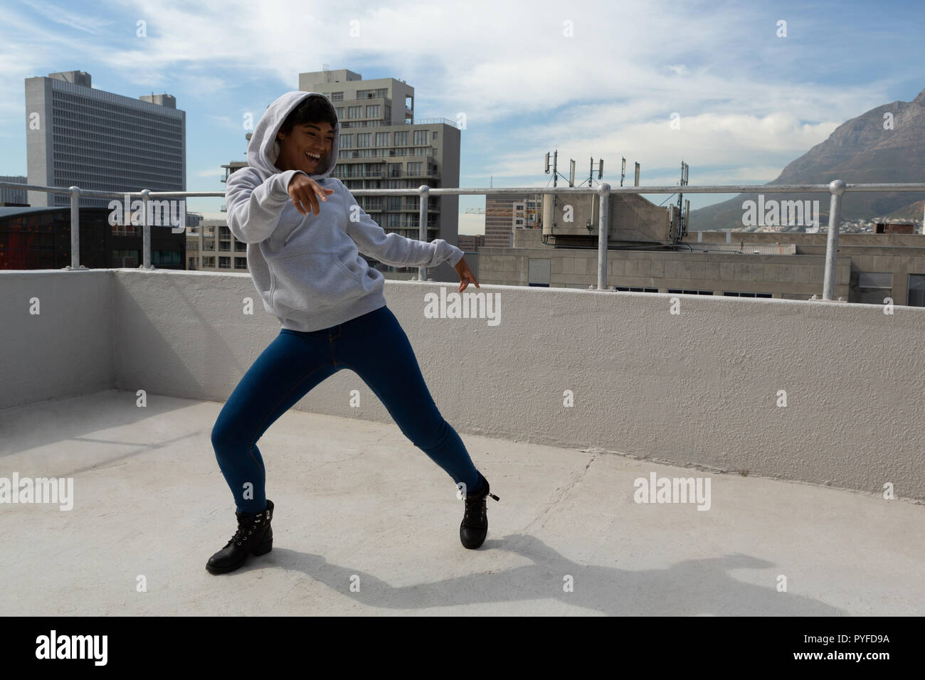 Model dancing on terrace Stock Photo - Alamy