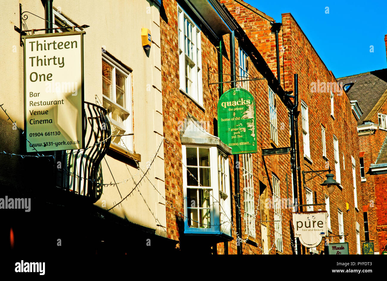Shop and Bar signs, Grape Lane, York, England Stock Photo - Alamy