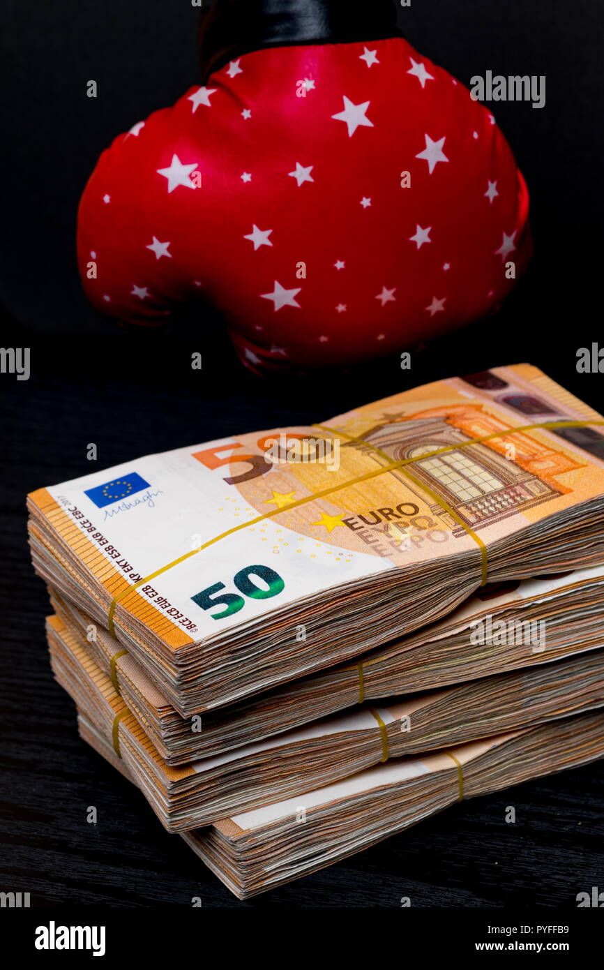red with stars boxing glove and cash money. Concept of bribery ...