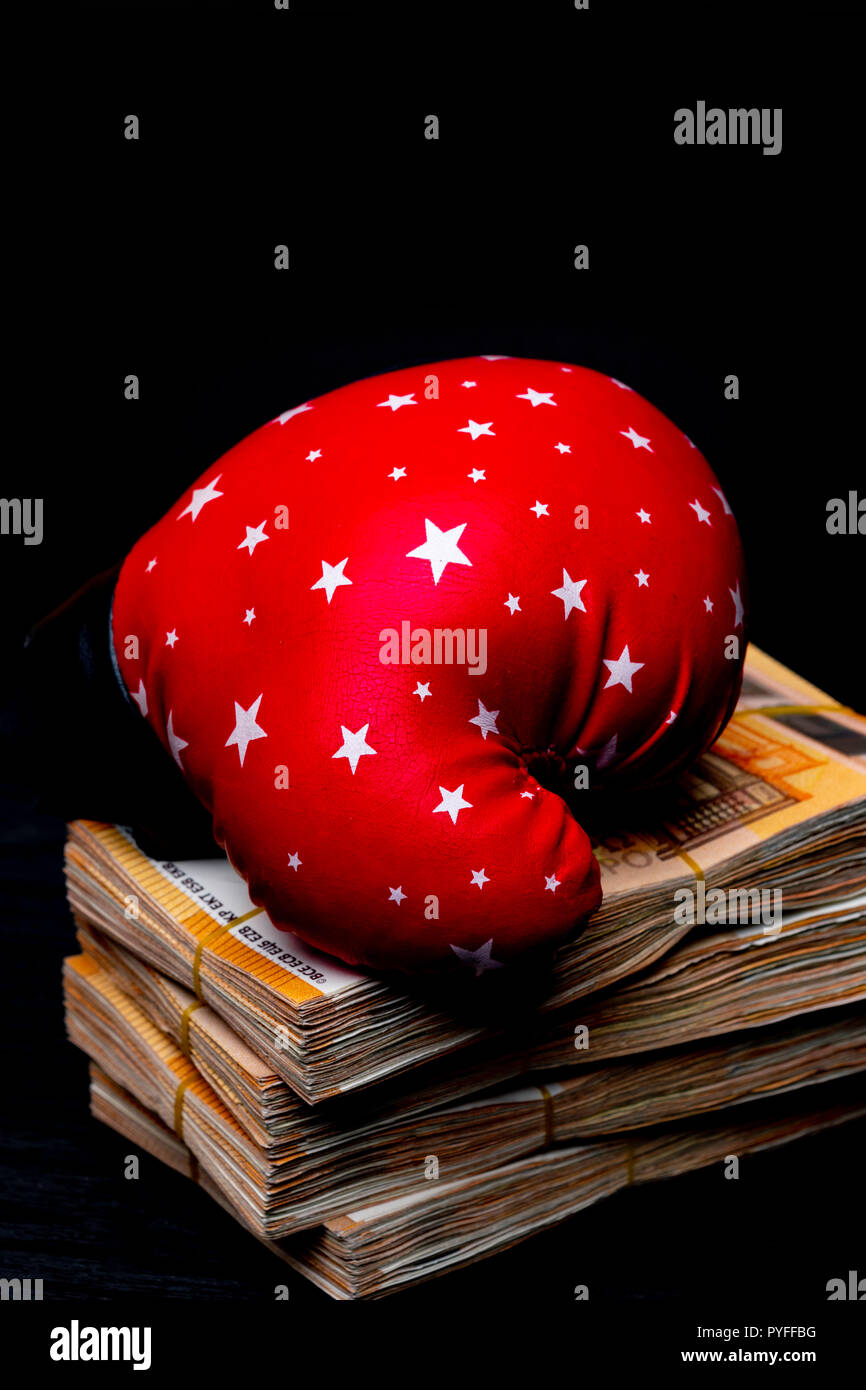 red with stars boxing glove and cash money. Concept of bribery ...