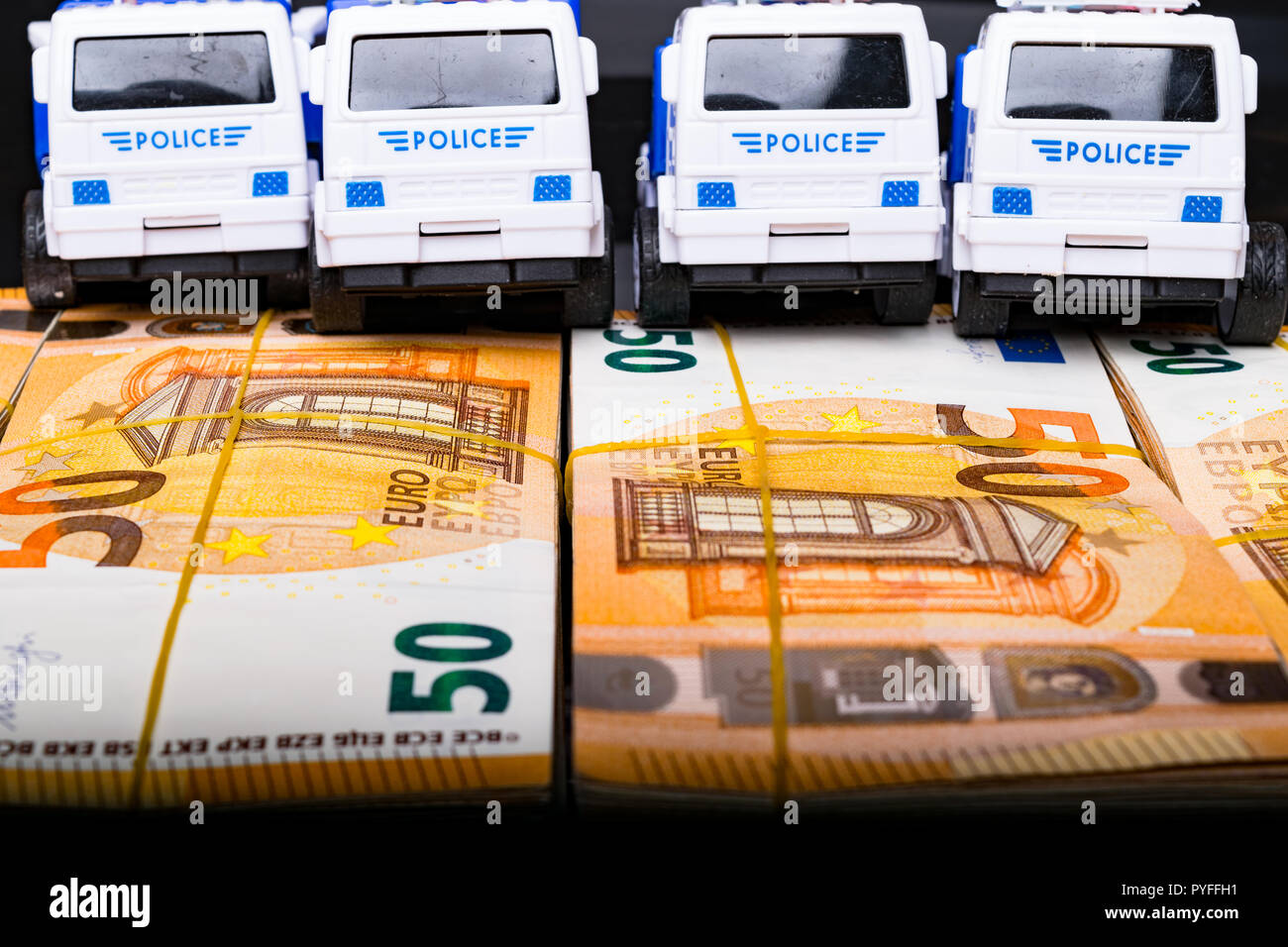 Police corruption in money. Police cars in euros. Crisis in money ...
