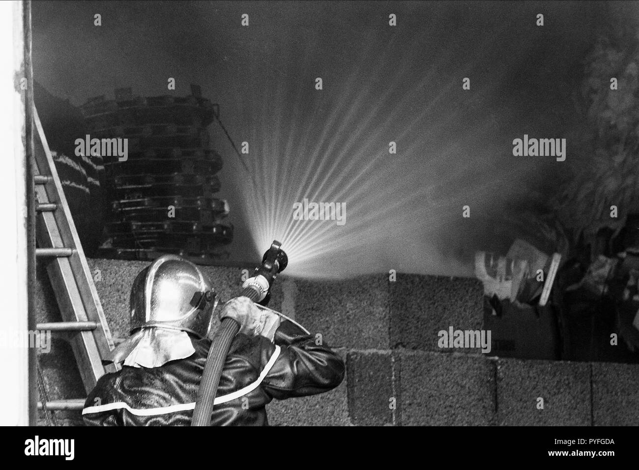 Archives 90ies: Firefighters fight fire in a fabric, Lyon, France Stock ...