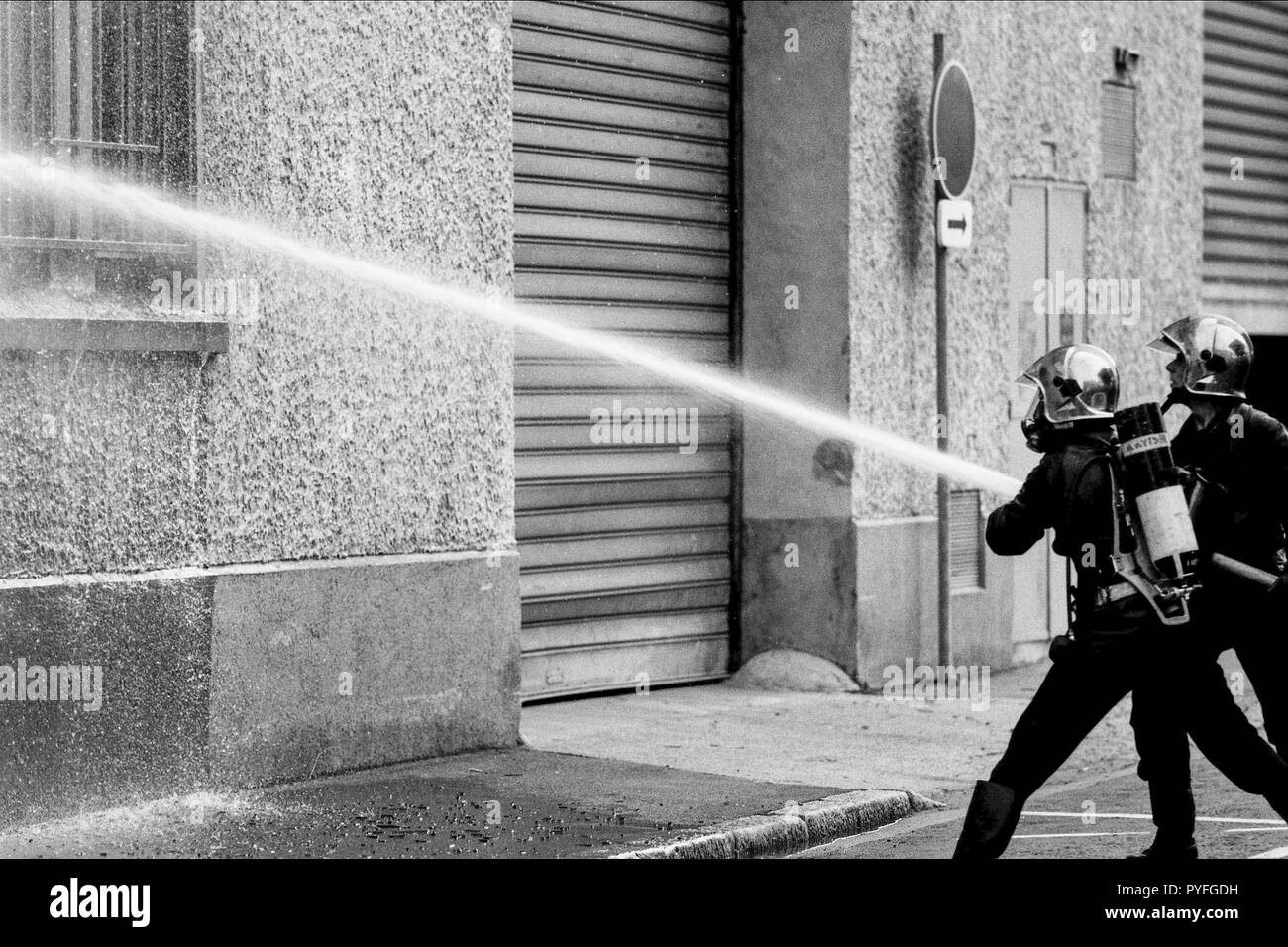 Archives 90ies: Firefighters fight fire in a fabric, Lyon, France Stock ...