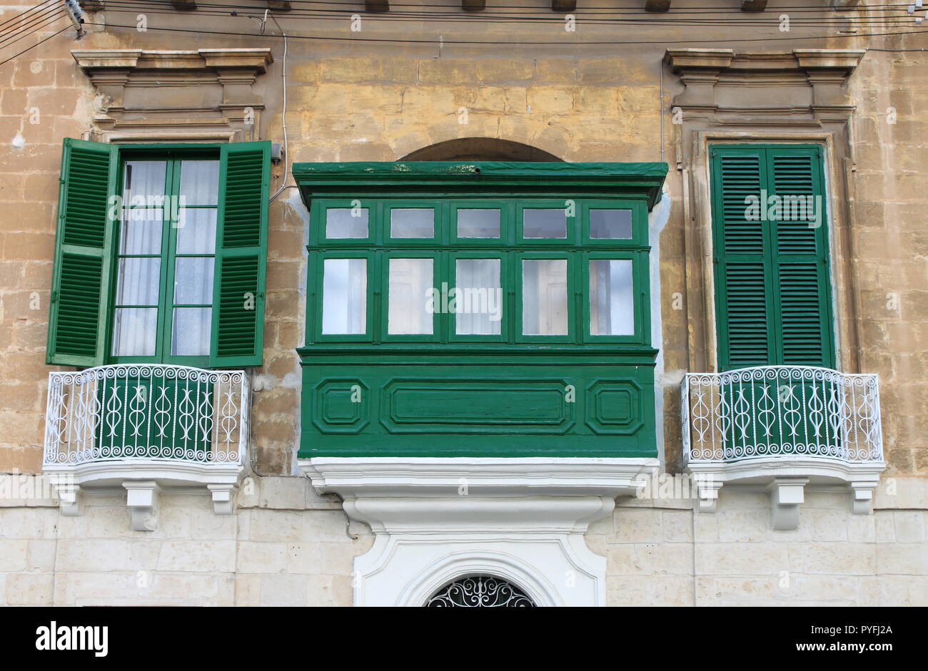 Typical colorful balconies and windows in Malta Stock Photo - Alamy
