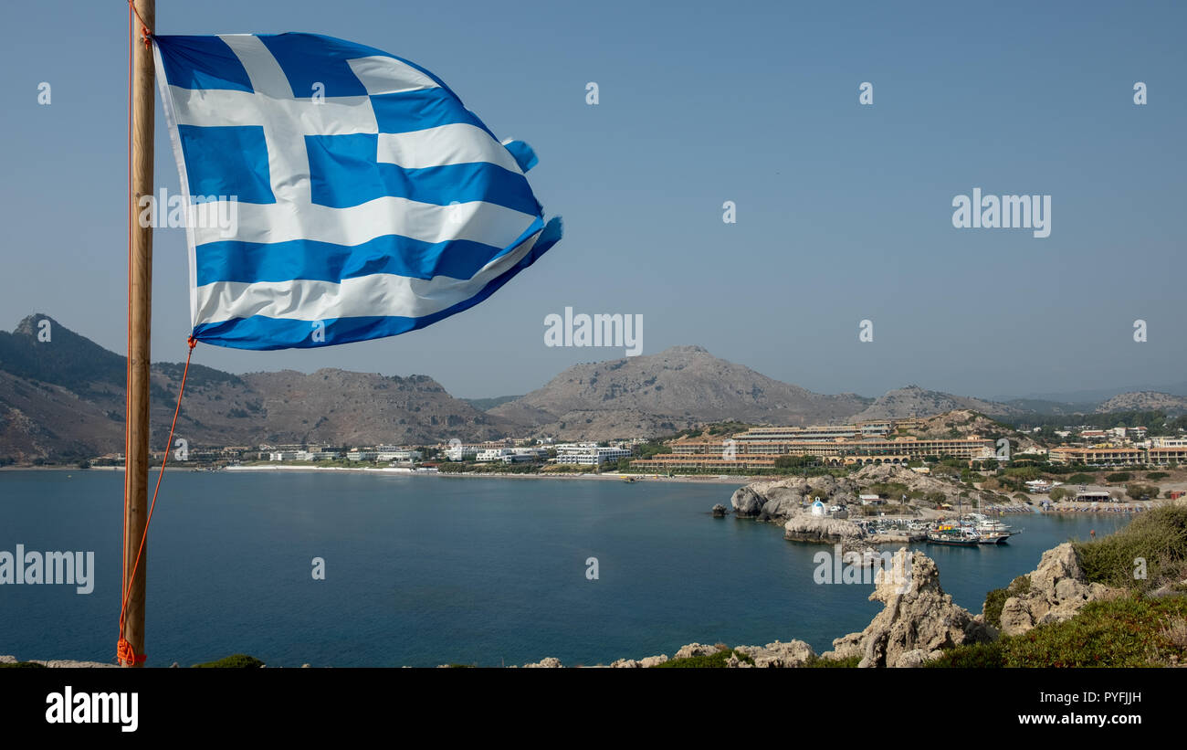 Greek flag flowing over sort in Rhodes, Greece Stock Photo - Alamy