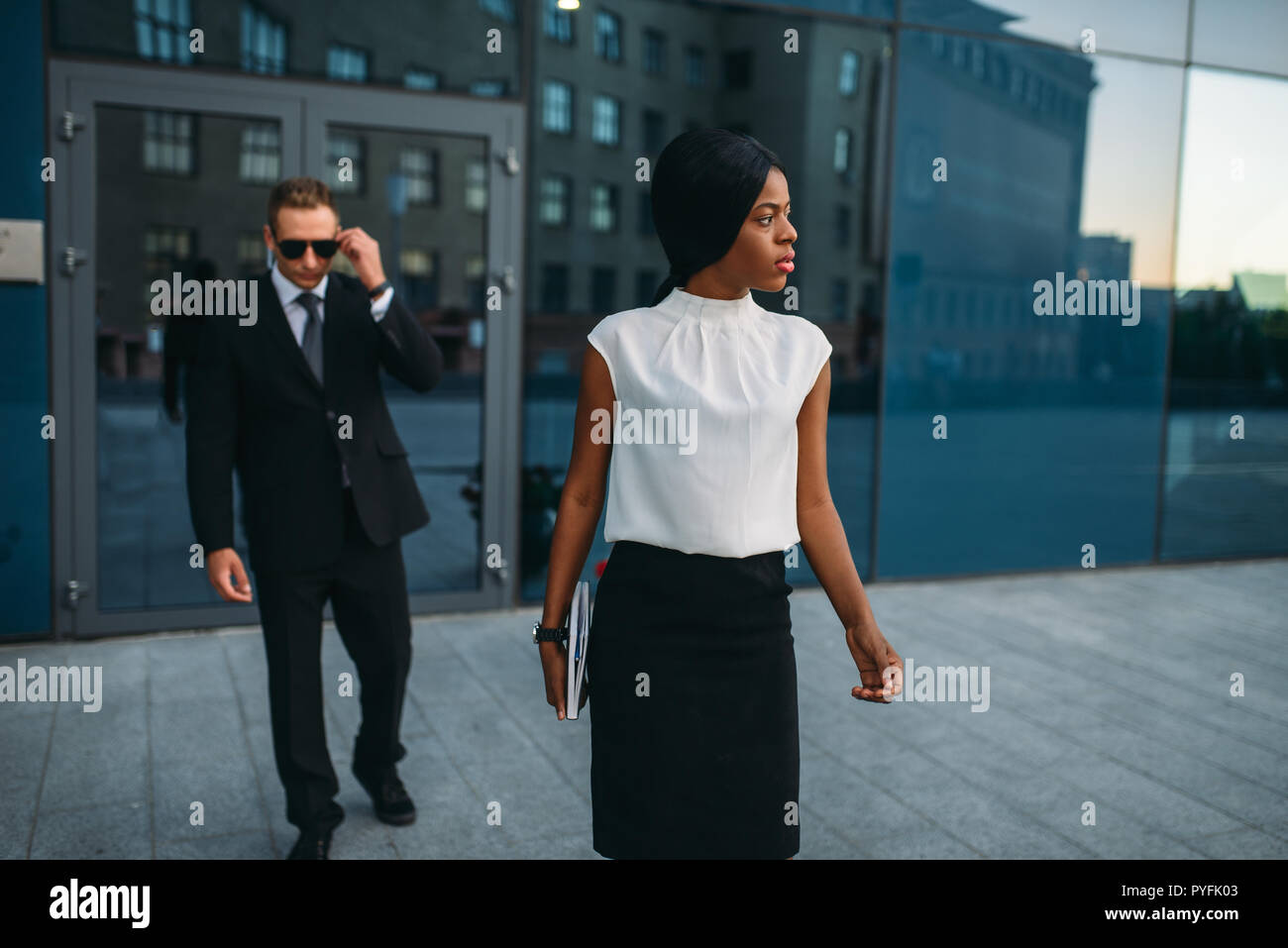 Woman security guard in suit hi-res stock photography and images - Alamy