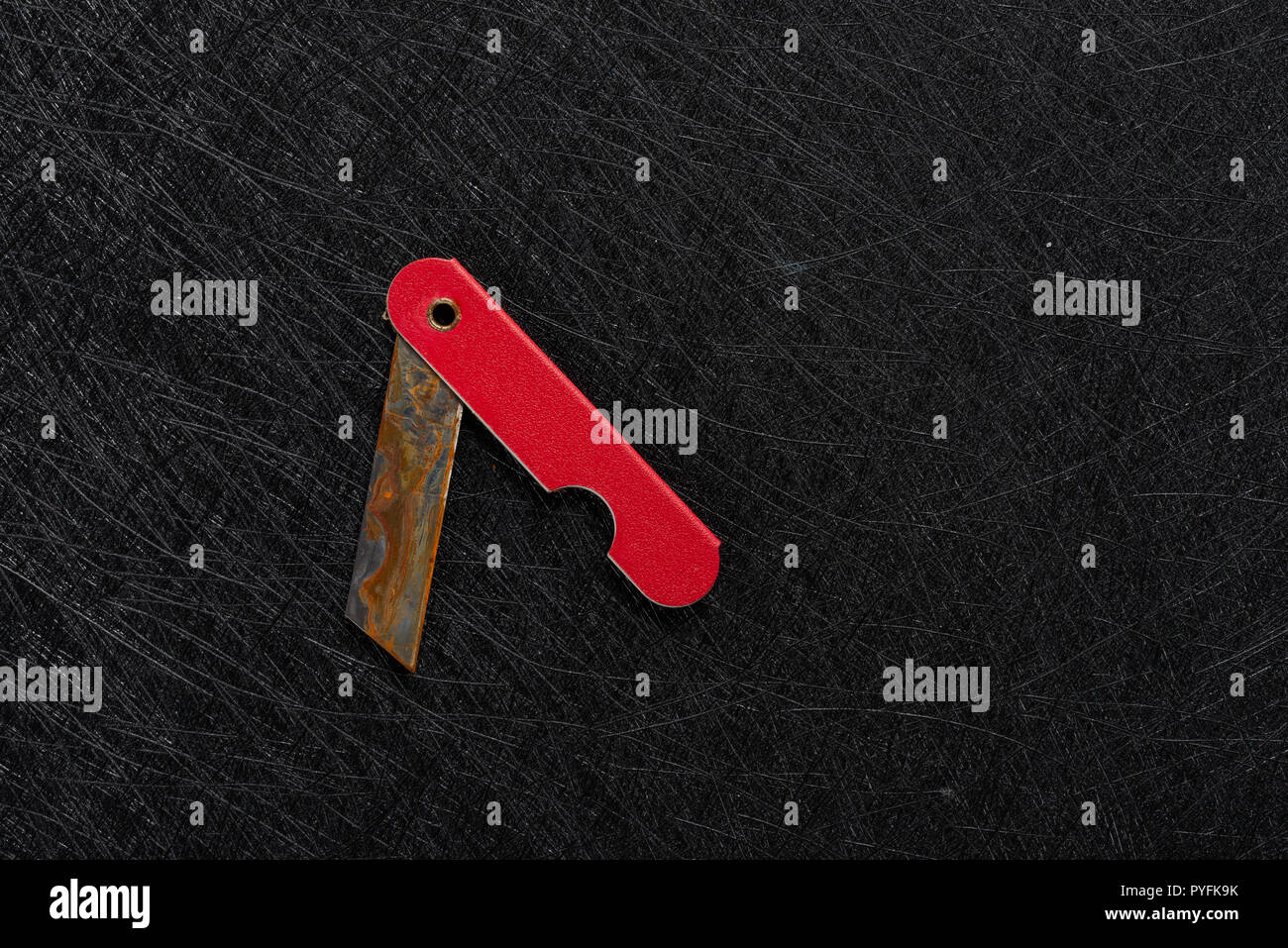 top view rusty knife on a dark background Stock Photo - Alamy