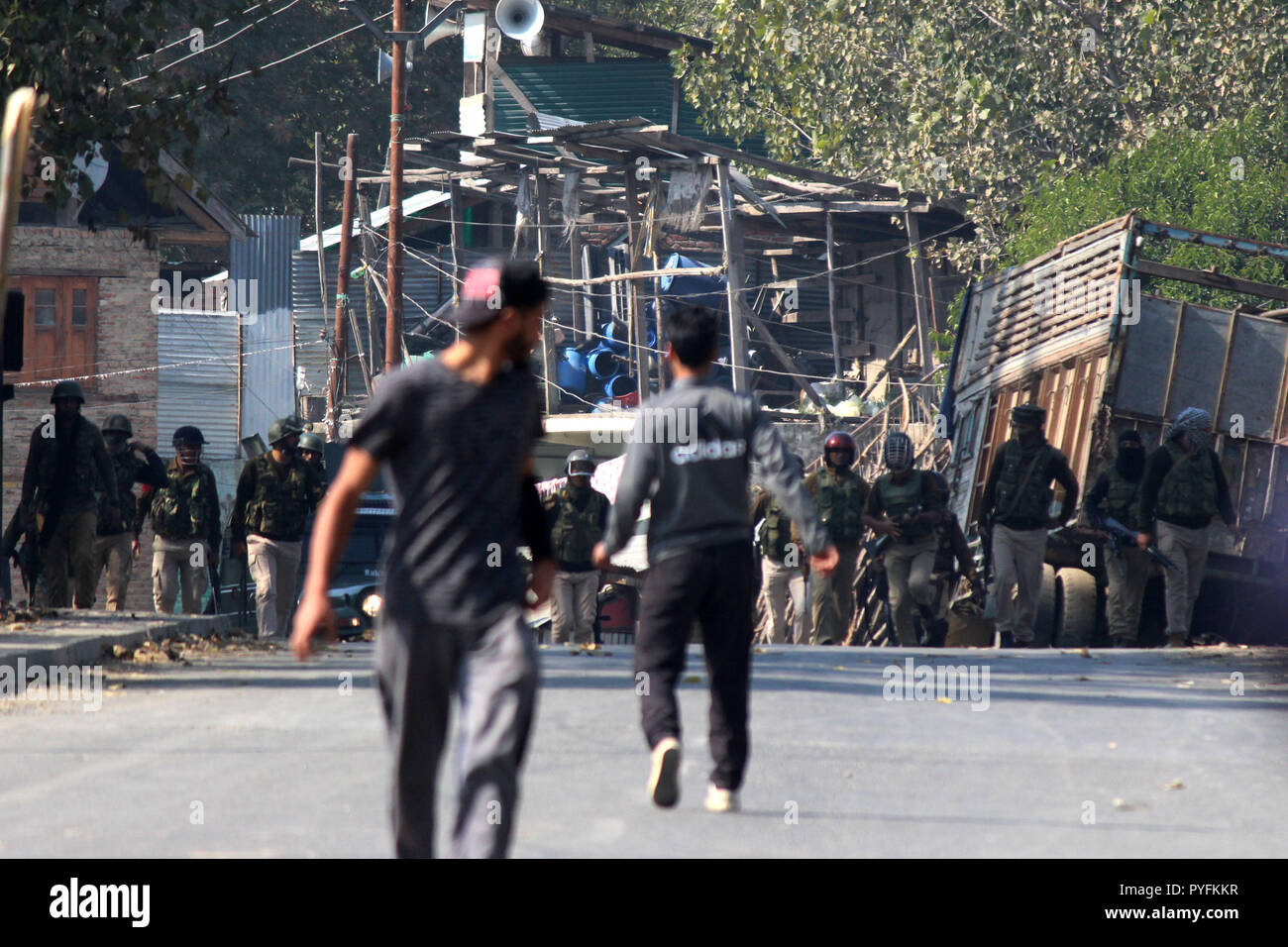 Kulgam, India. 27th Oct, 2018. Clashes between security forces and ...