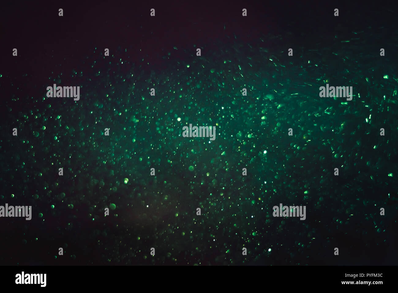 Abstract lighting, dust, particle and glare on a dark background Stock ...