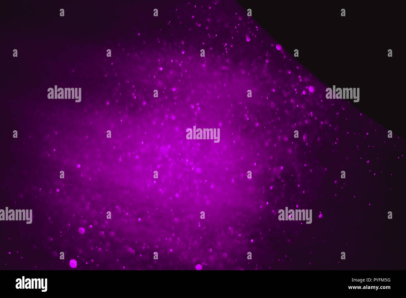 Abstract lighting, dust, particle and glare on a dark background Stock ...