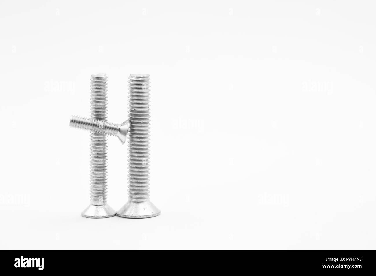 set of screw in the white space like concept of family Stock Photo - Alamy