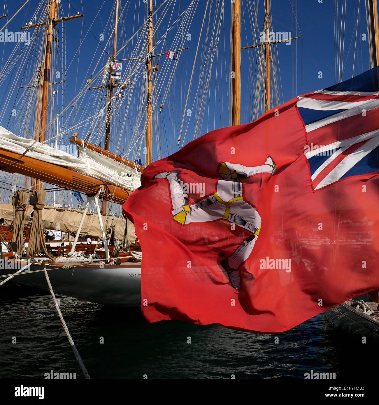 AJAXNETPHOTO. CANNES, FRANCE. - THREE LEGS OF MAN - RED ENSIGN FLAG OF ...