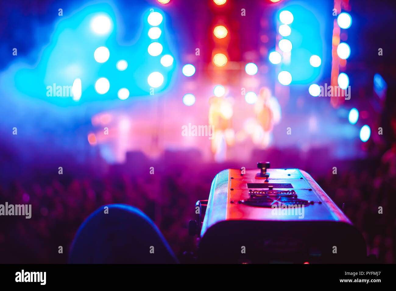 Stage lights on concert. Lighting equipment with multicolored beams ...