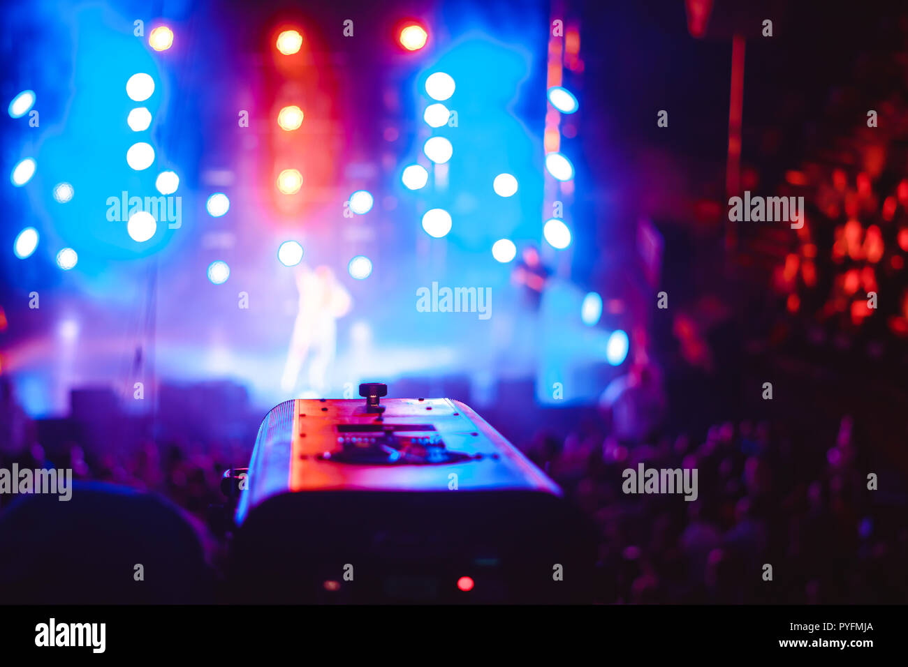 Stage lights on concert. Lighting equipment with multicolored beams ...