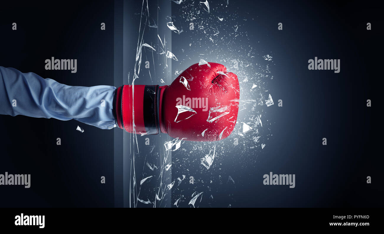 Big hand hits intense and breaks glasses Stock Photo - Alamy