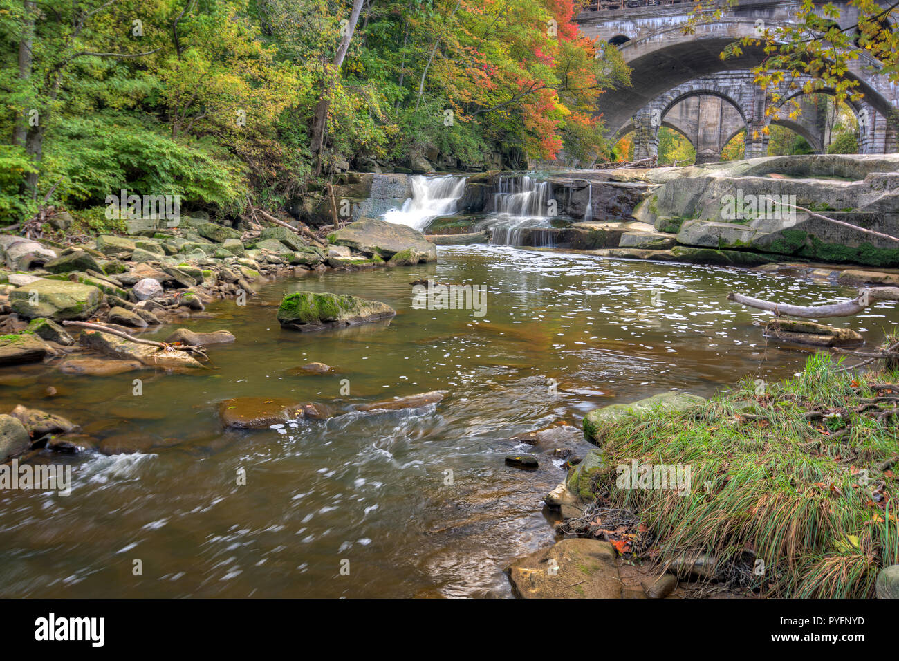 Berea Falls Ohio with fall colors. This cascading waterfall looks it's ...