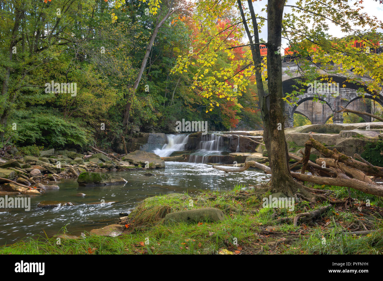 Berea Falls Ohio with fall colors. This cascading waterfall looks it's ...