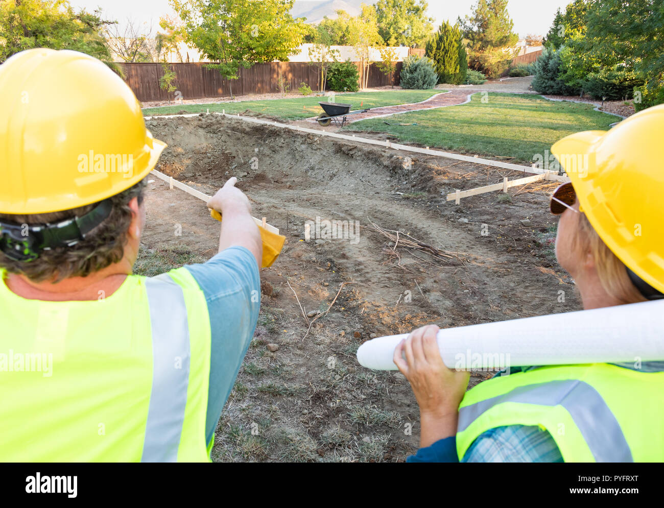 Woman overlooking pool hi-res stock photography and images - Alamy