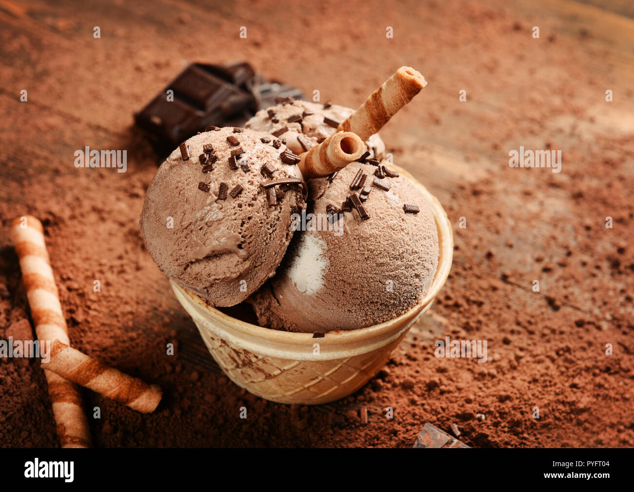 Chocolate ice cream on woodn background Stock Photo - Alamy