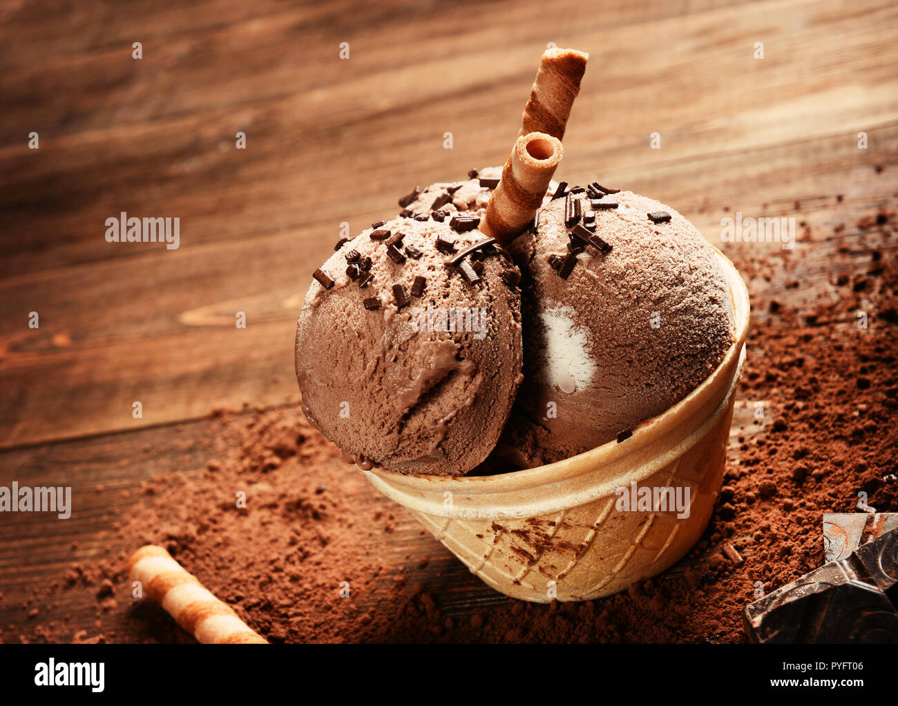 Chocolate ice cream on woodn background Stock Photo - Alamy