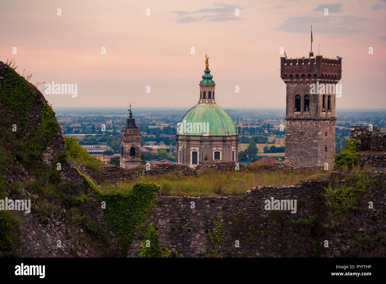 View of the medieval tower and the dome of the Cathedral in Lonato ...